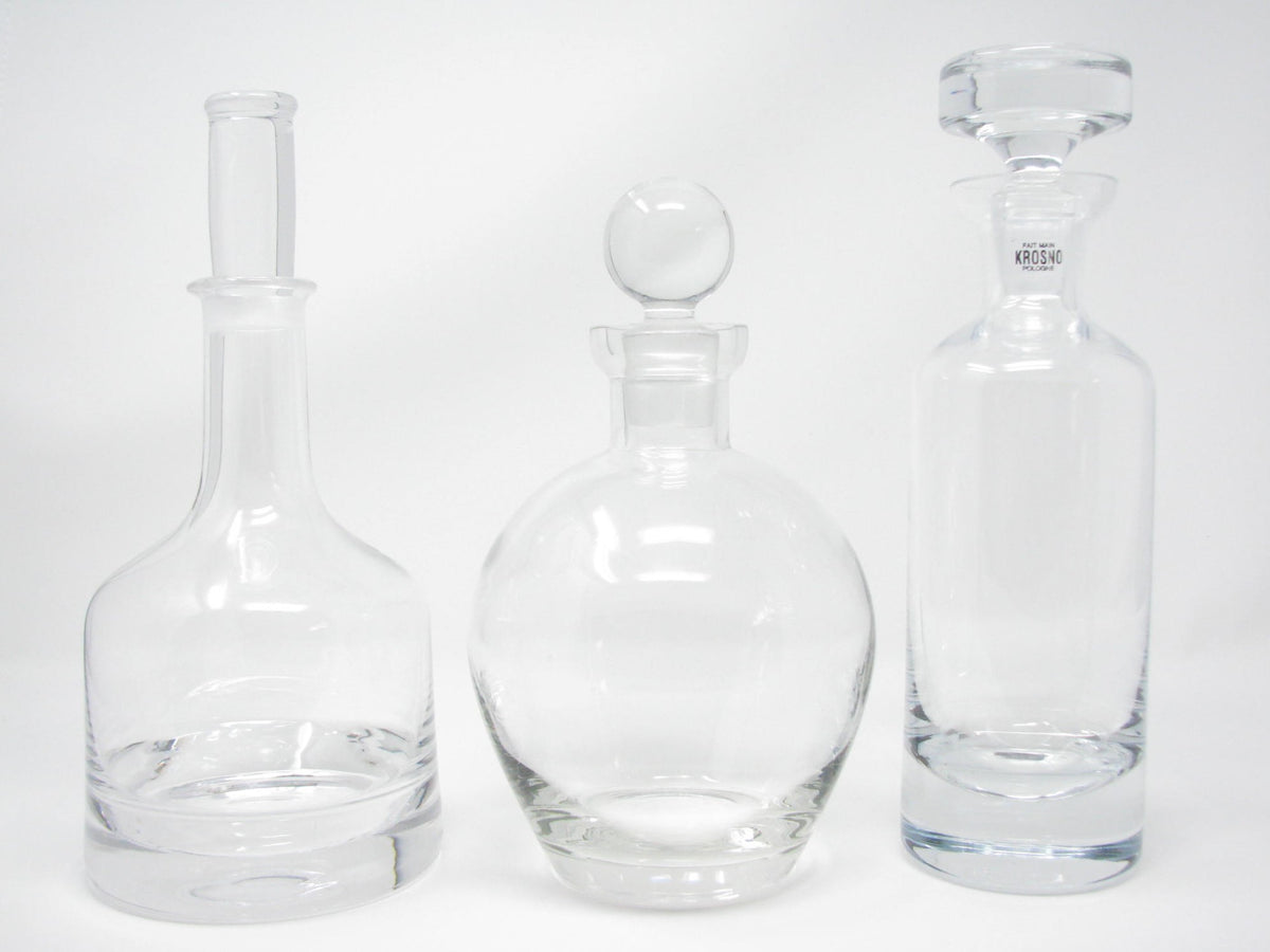 Vintage Collection of Crystal and Glass Decanters in Various Shapes Si ...